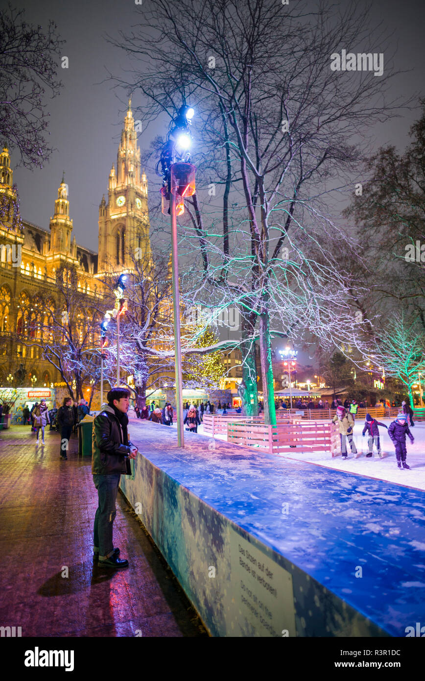 Austria, Vienna, Rathausplatz ice skating rink by Town Hall, Christmas ...