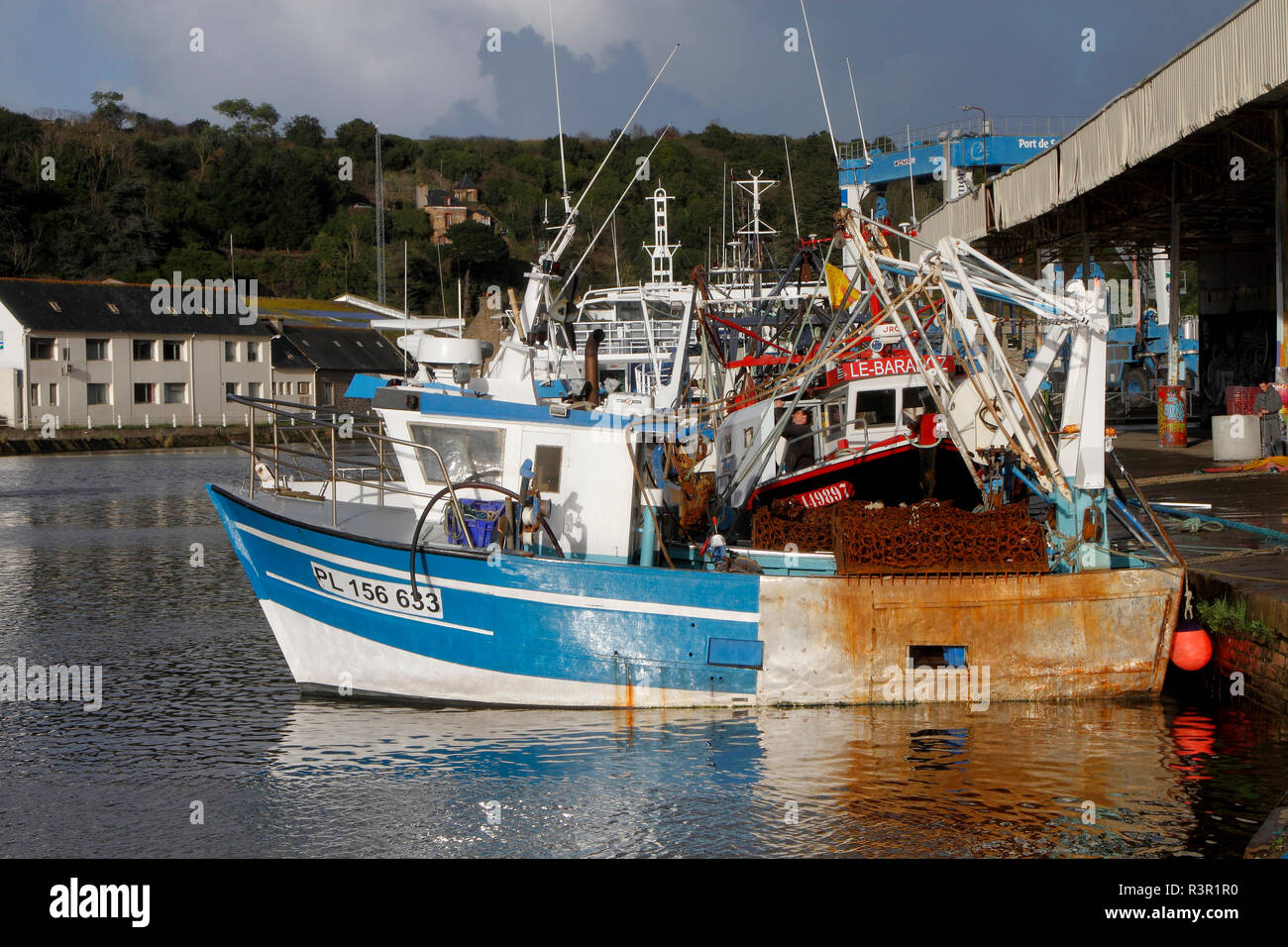 Trawlers equipped for scallop fishing in the port of Le Legue in Saint ...
