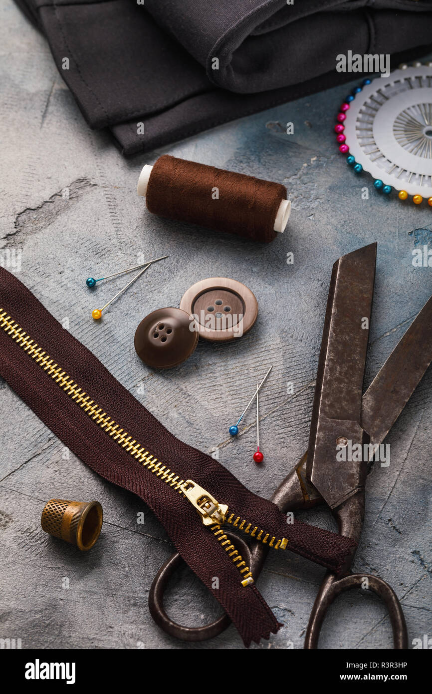 Tools for sewing and repairing clothes Stock Photo - Alamy