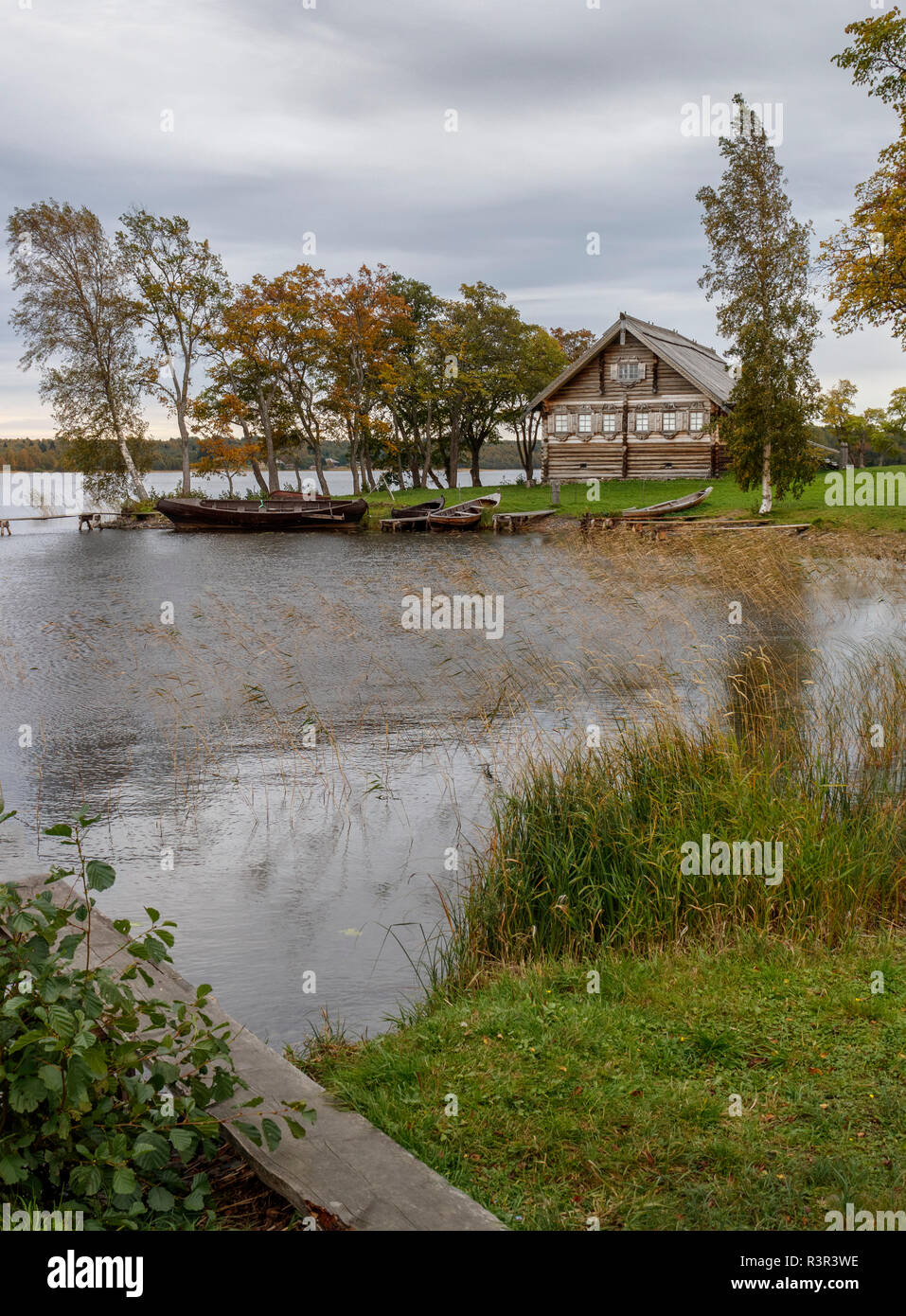 The outdoor museum of Kizhi Island on Lake Onega, Russia. Boats moored ...