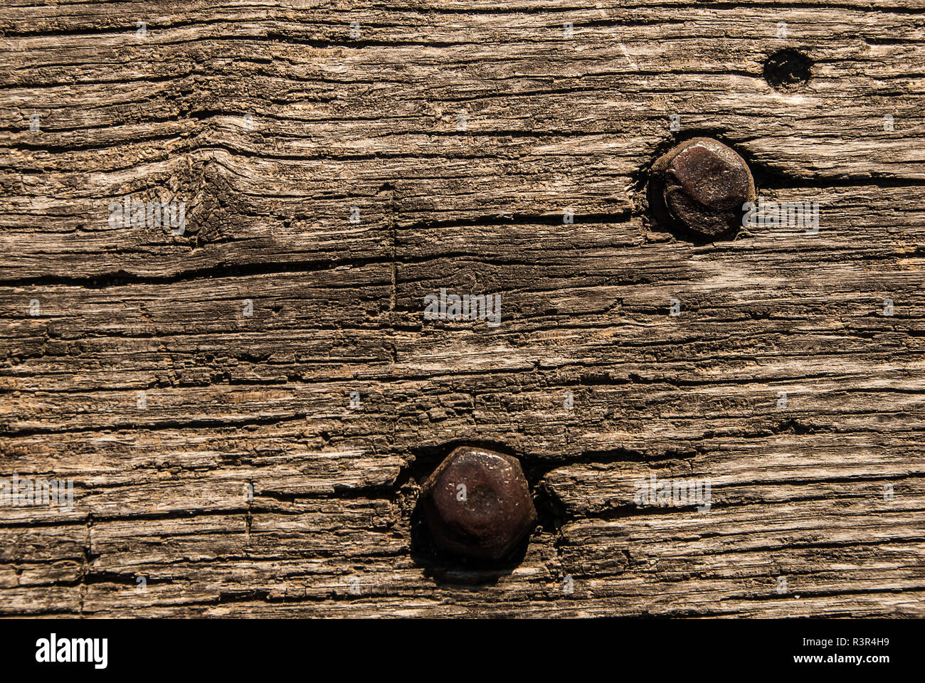 Old wooden bench texture with metal nut and bolt, closeup. Aged Solid ...