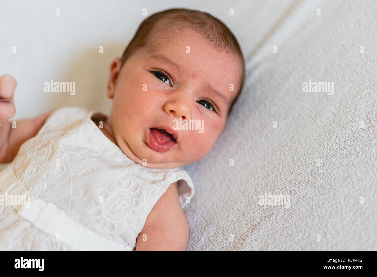 Newborn baby yawning Stock Photo - Alamy