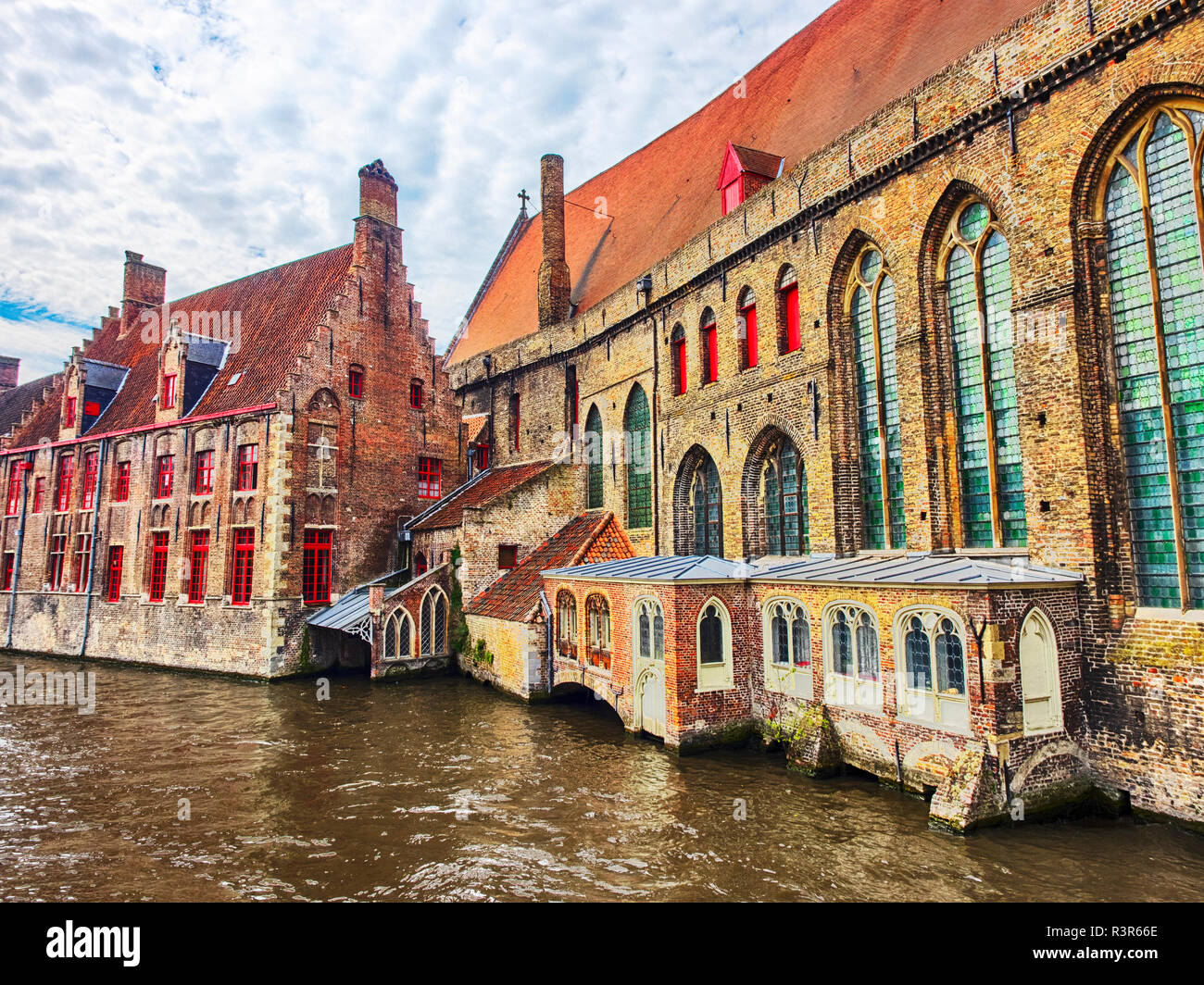 Belgium, Brugge, West Flanders, Canal Image of Memling Museum located ...