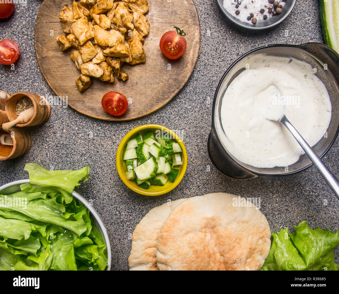 Ingredients for cooking the home doner, fried chicken, condiments ...