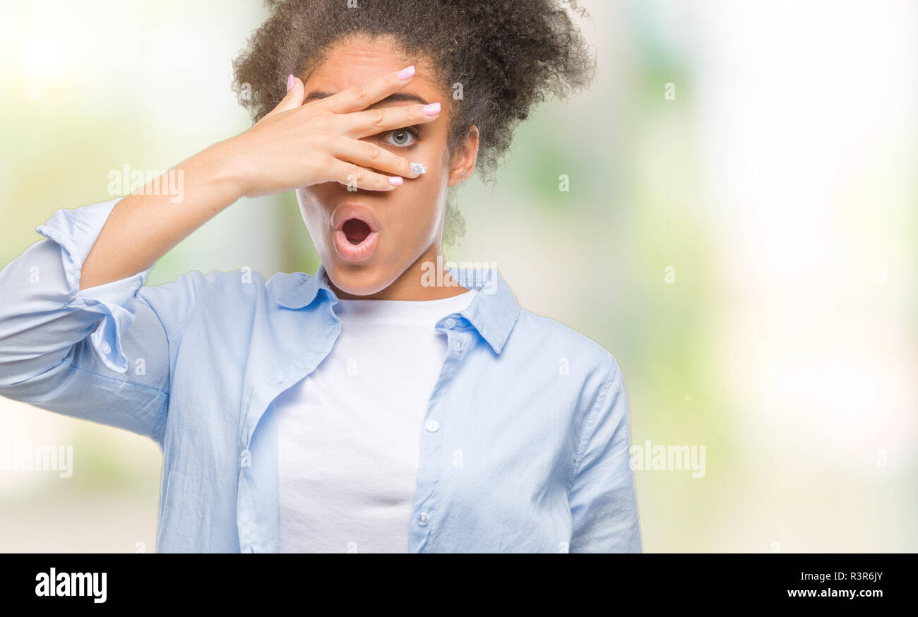 Hand over eyes peeking woman hi-res stock photography and images - Alamy