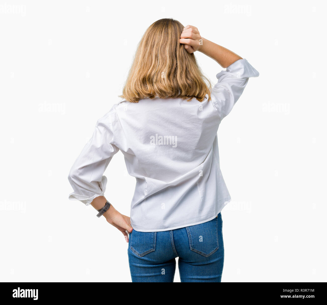 Beautiful young business woman over isolated background Backwards ...