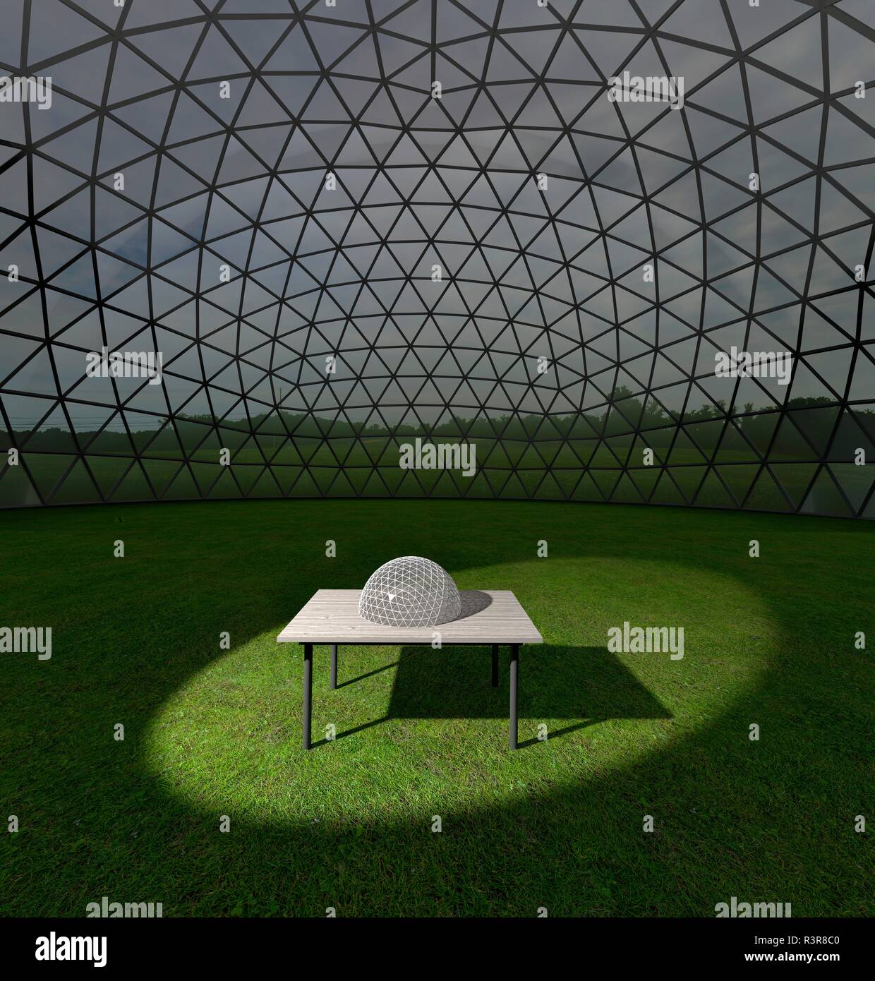 Inside a geodesic dome, with a model of itself illuminated on a table ...