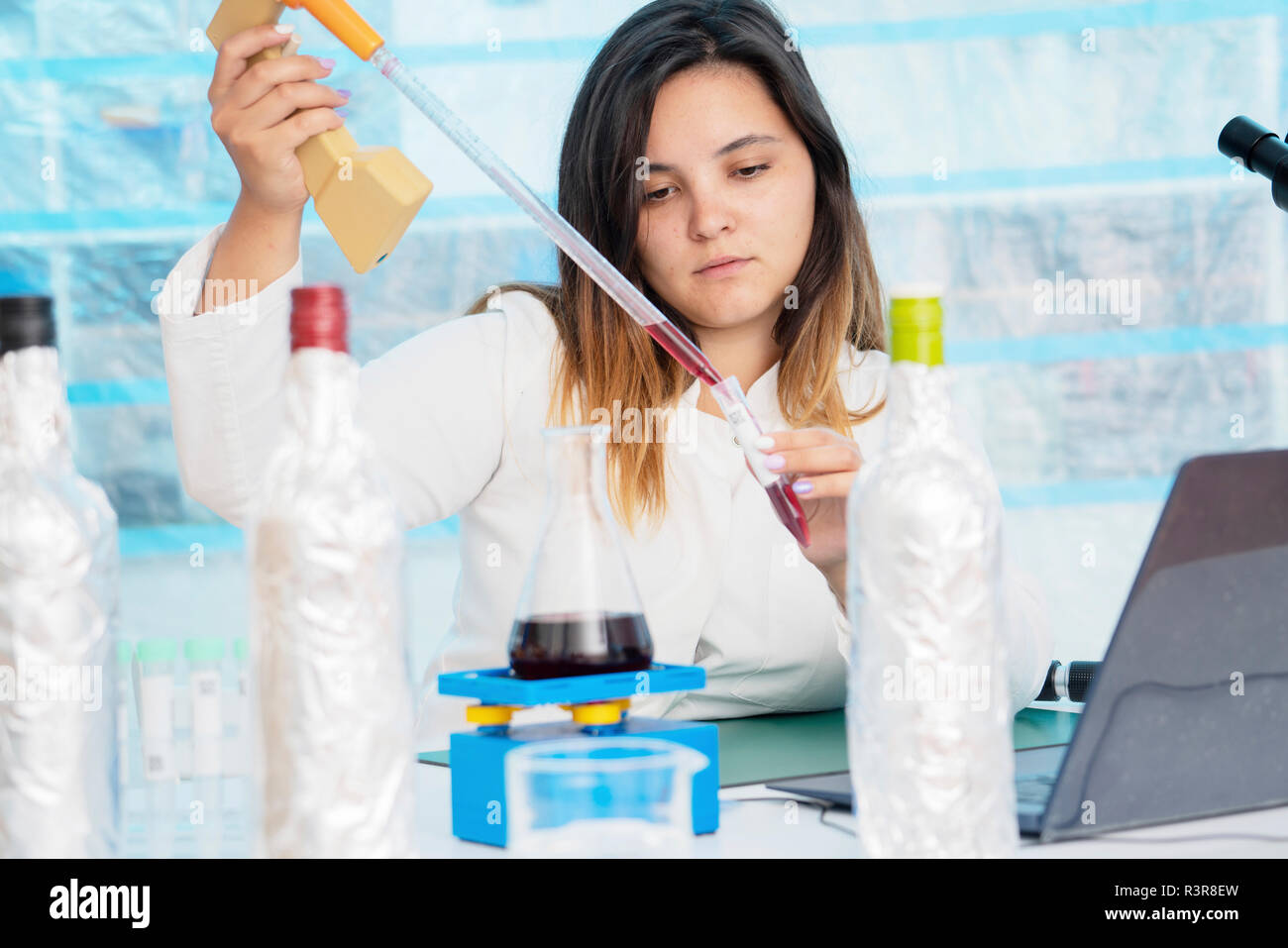 Testing wine in quality control lab Stock Photo - Alamy