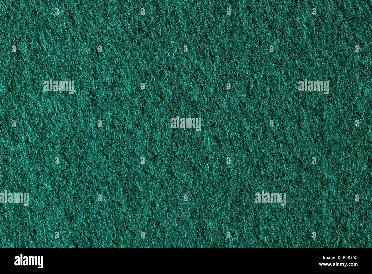 Poker table felt background in green color Stock Photo - Alamy