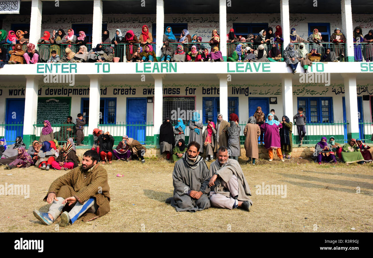 People watch the funeral of Azad Ahmad Malik alias Dada in Arwani Area ...