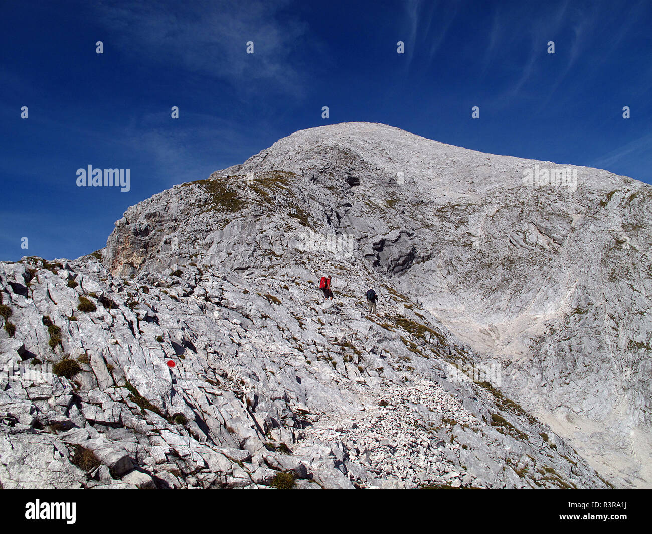 Mountaineers climbing Mount Alpspitze south ridge route in Bavaria ...