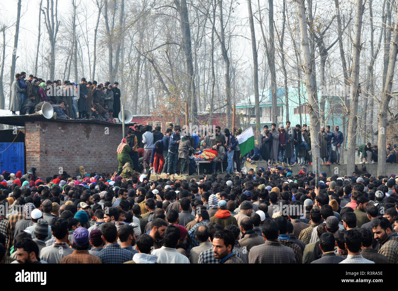 People attend the funeral of Azad Ahmad Malik alias Dada in Arwani Area ...