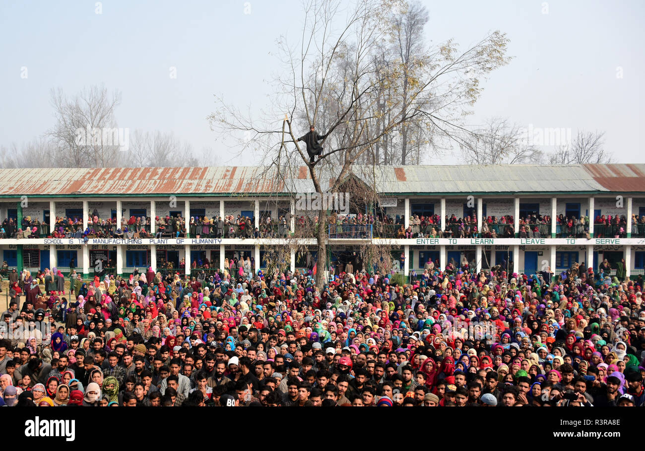 People attend the funeral of Azad Ahmad Malik alias Dada in Arwani Area ...