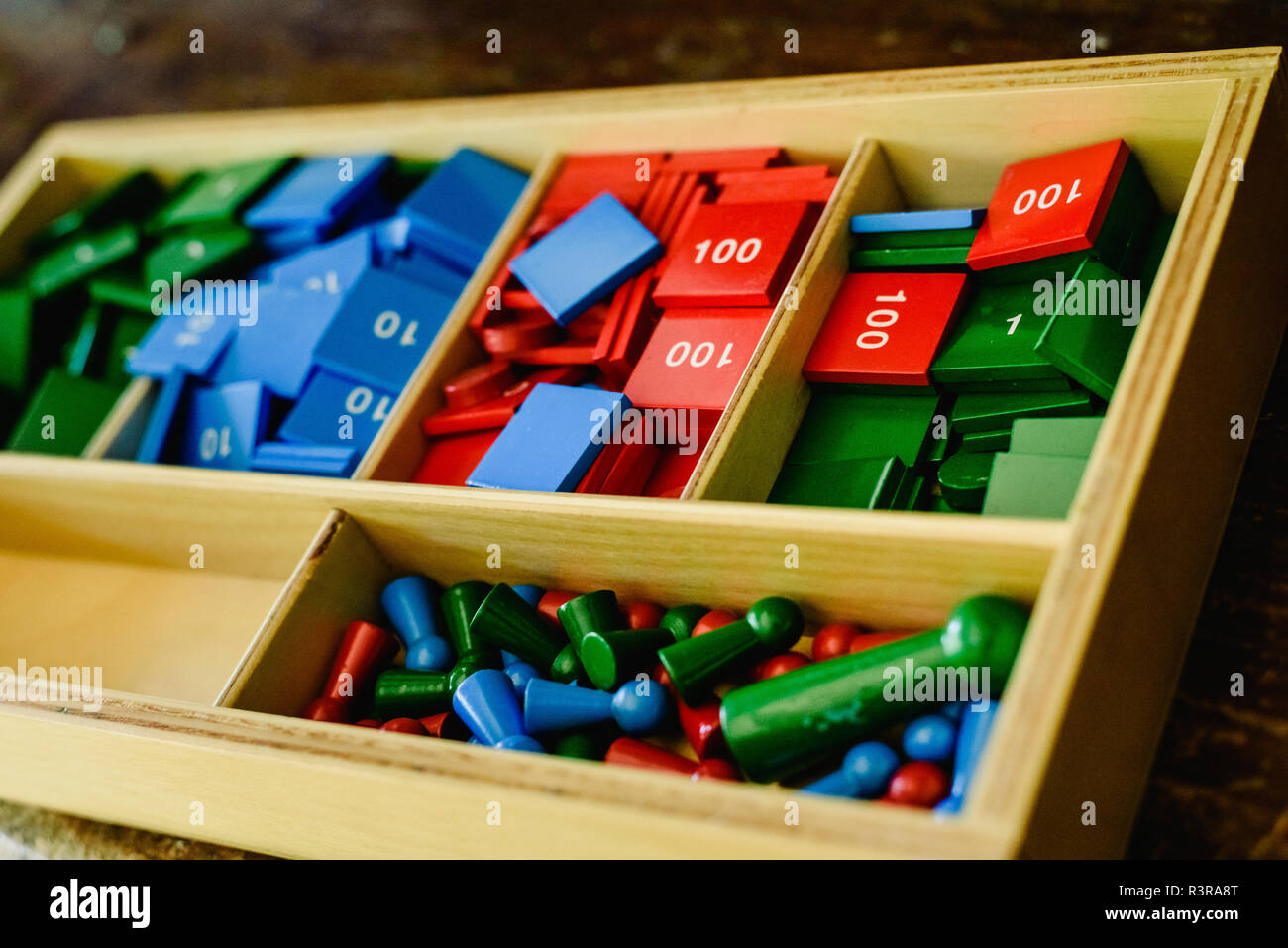 Wooden box with numbers to teach mathematics Stock Photo - Alamy
