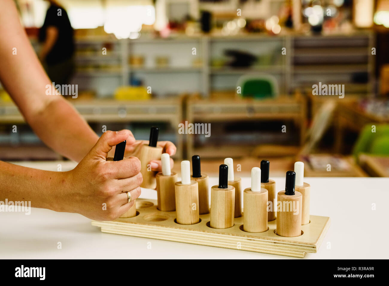 Wooden push-buttons in a montessori classroom pulsed by the teacher to ...
