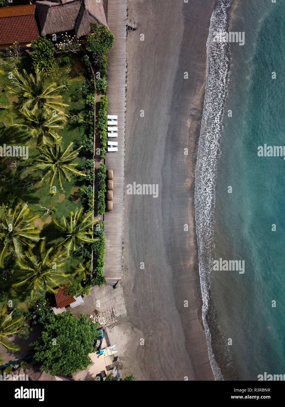 Indonesia, Bali, Aerial view of beach with empty sun loungers Stock ...