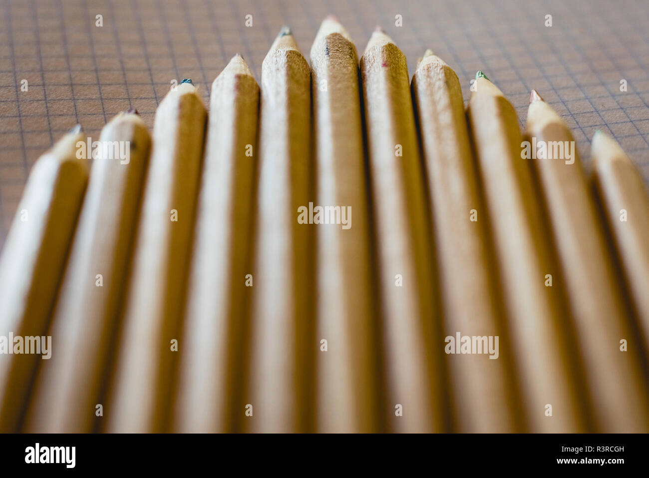 Group of pencils arranged on graph paper Stock Photo - Alamy