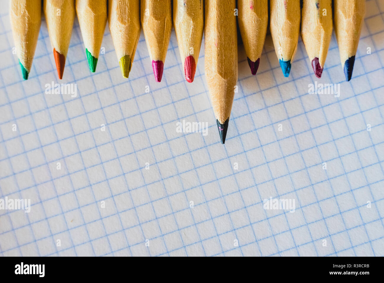 Group of pencils arranged on graph paper Stock Photo - Alamy