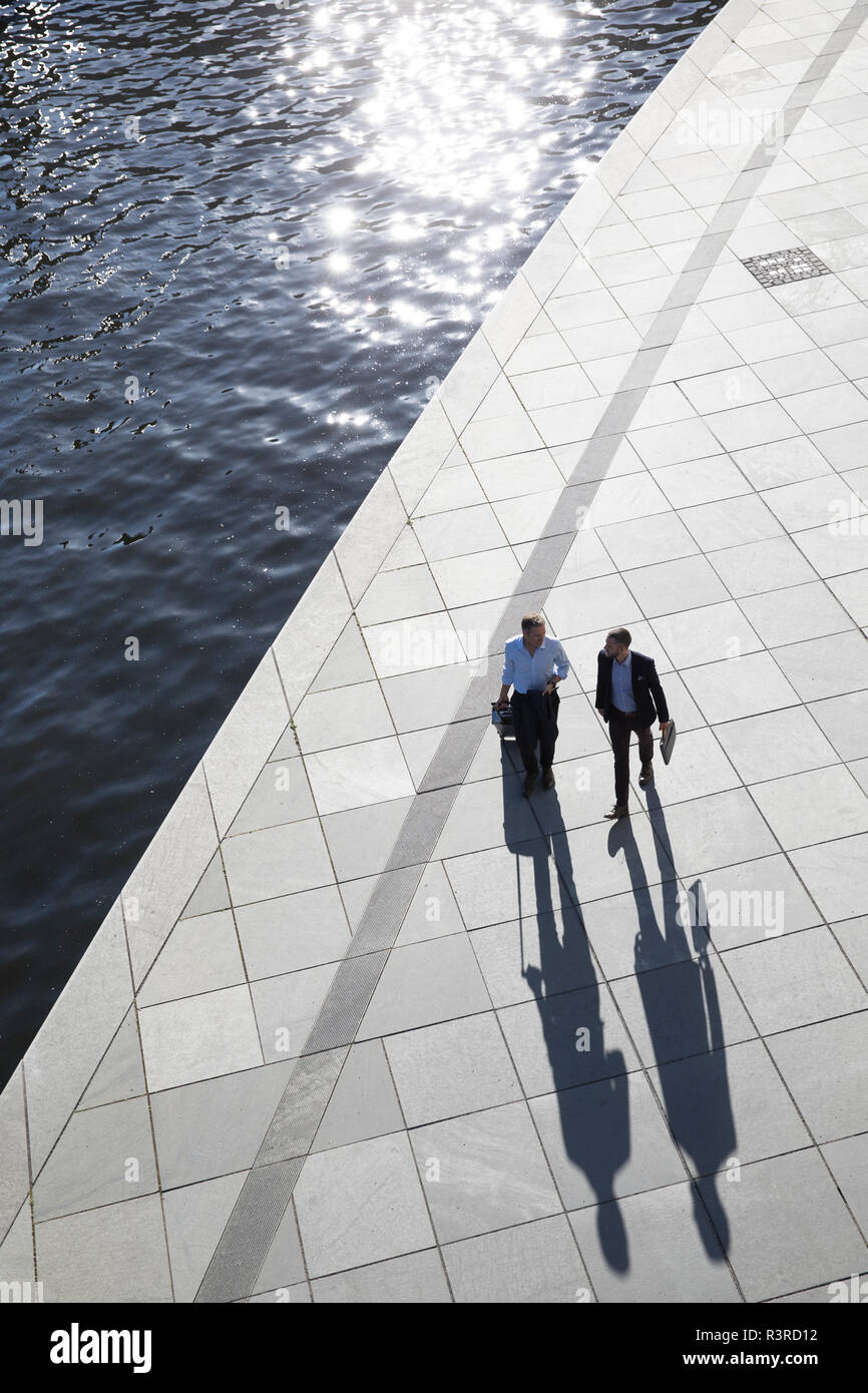 Group of businessmen walking hi-res stock photography and images - Alamy