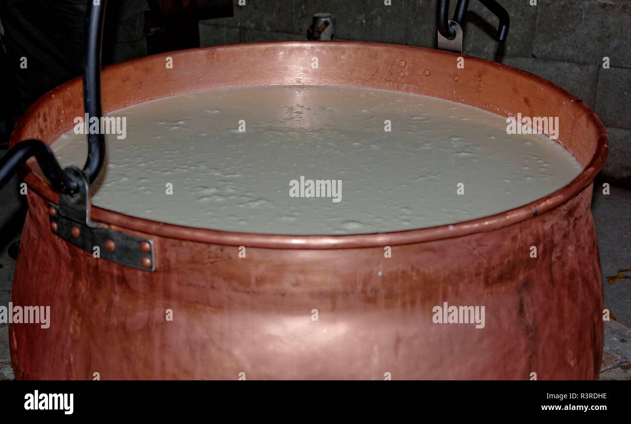 curd cheese heating in copper tub Stock Photo - Alamy