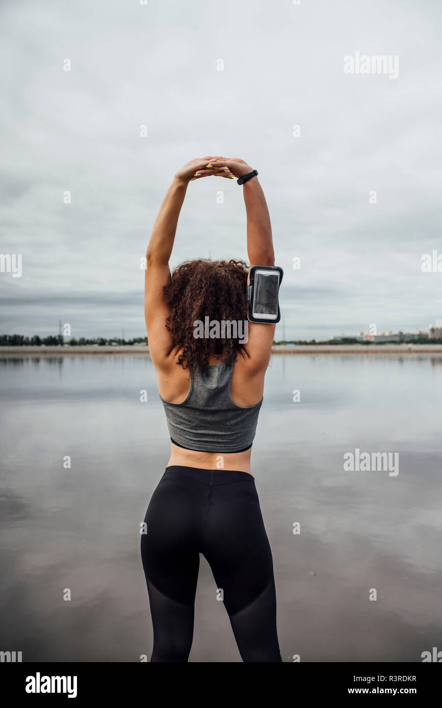 Young sportsman stretching hi-res stock photography and images - Alamy
