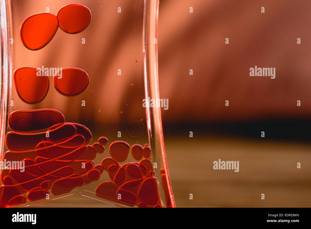 Drops blood falling in glass hi-res stock photography and images - Alamy