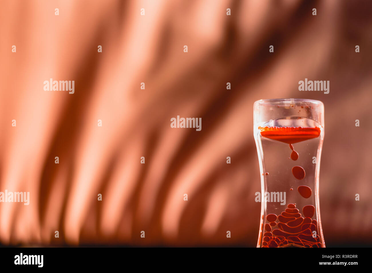 Drops blood falling in glass hi-res stock photography and images - Alamy