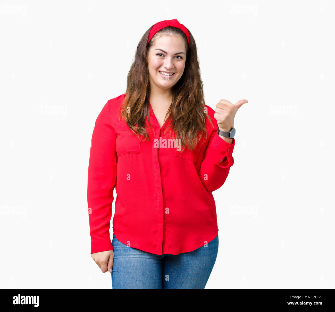 Beautiful plus size young woman over isolated background smiling with ...