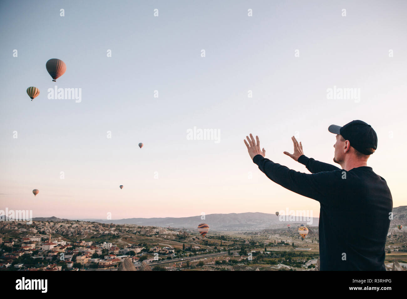 Man flying balloons hi-res stock photography and images - Alamy