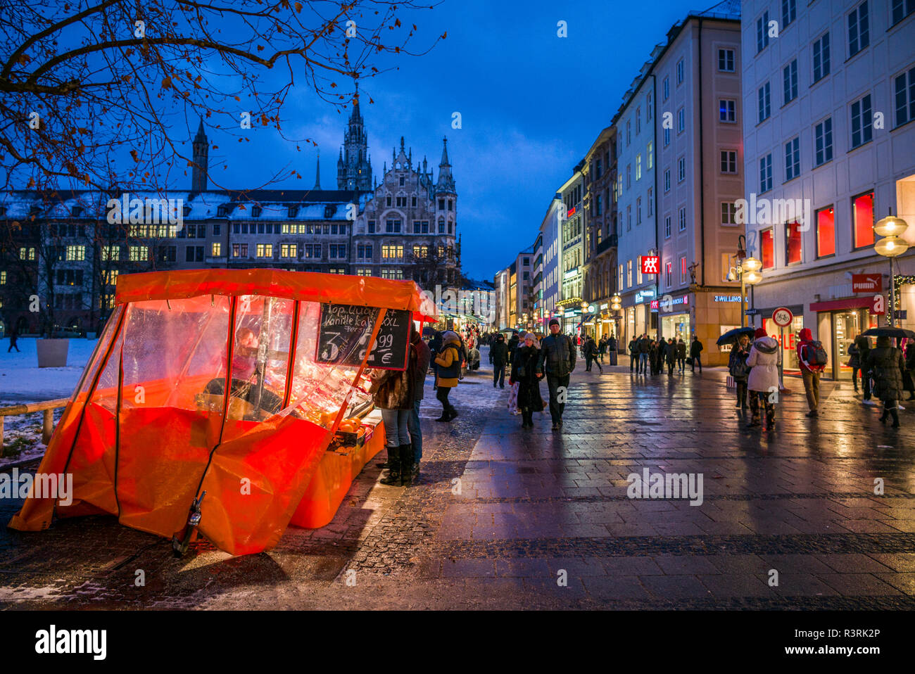 Germany, Bavaria, Munich. Theatiner Strasse shopping district, produce ...