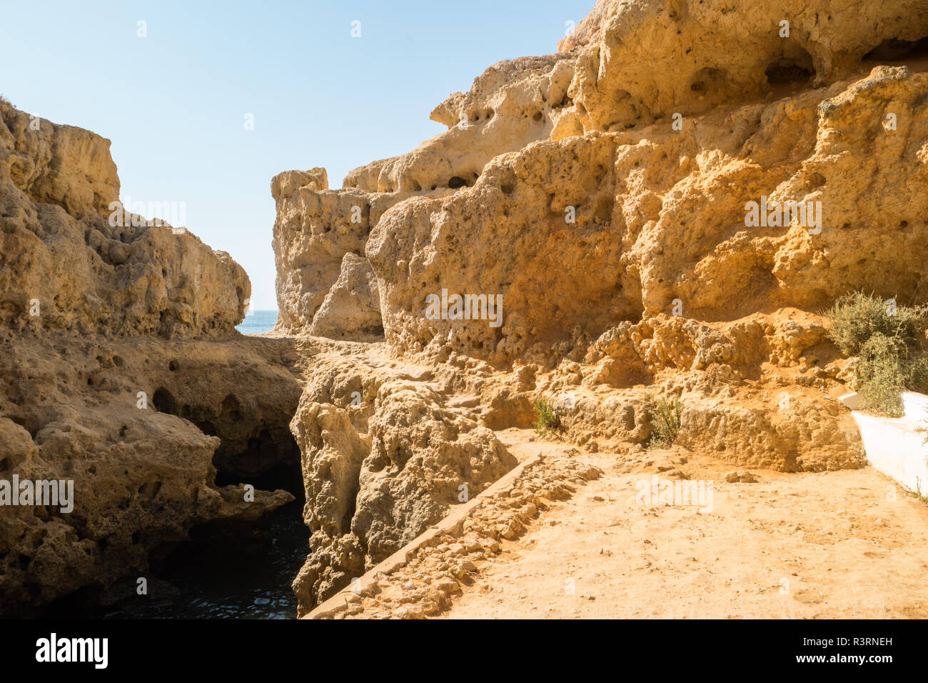 A pool of natural sea water between sandstone cliffs at Algar Seco ...