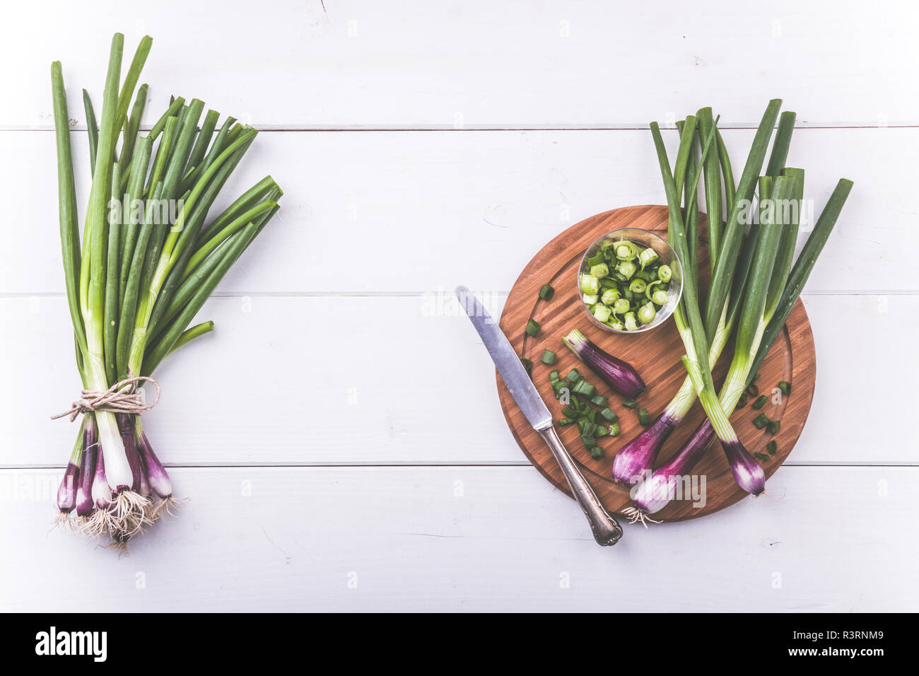 Fresh Red spring onions scallions on a wooden underground Stock Photo ...