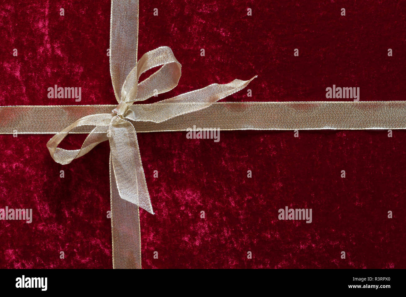 red velvet with golden ribbons Stock Photo - Alamy