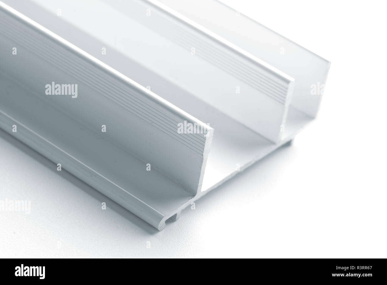 Aluminium profile sample isolated on white background Stock Photo - Alamy