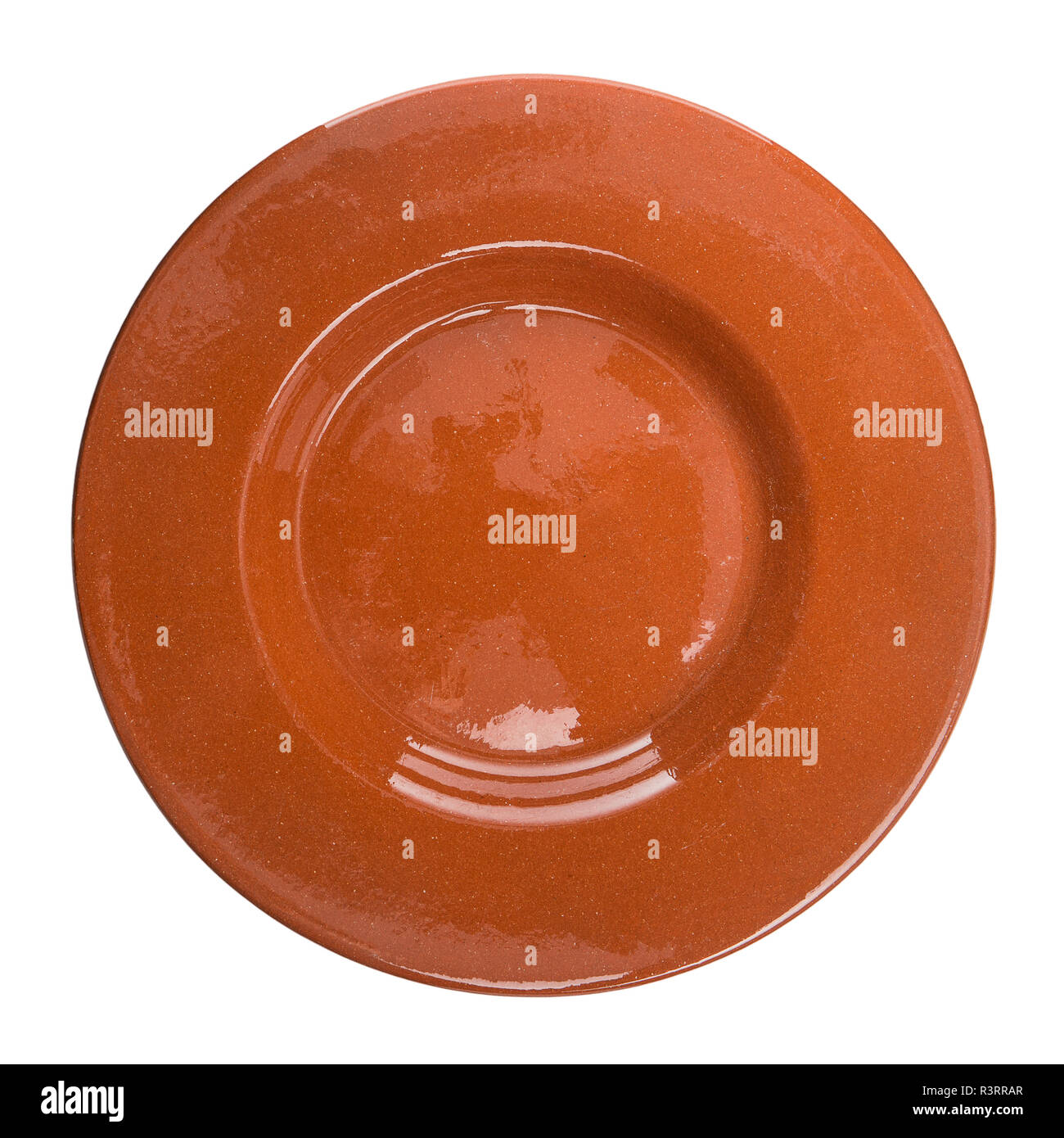 Red ceramic plate isolated on white background Stock Photo - Alamy