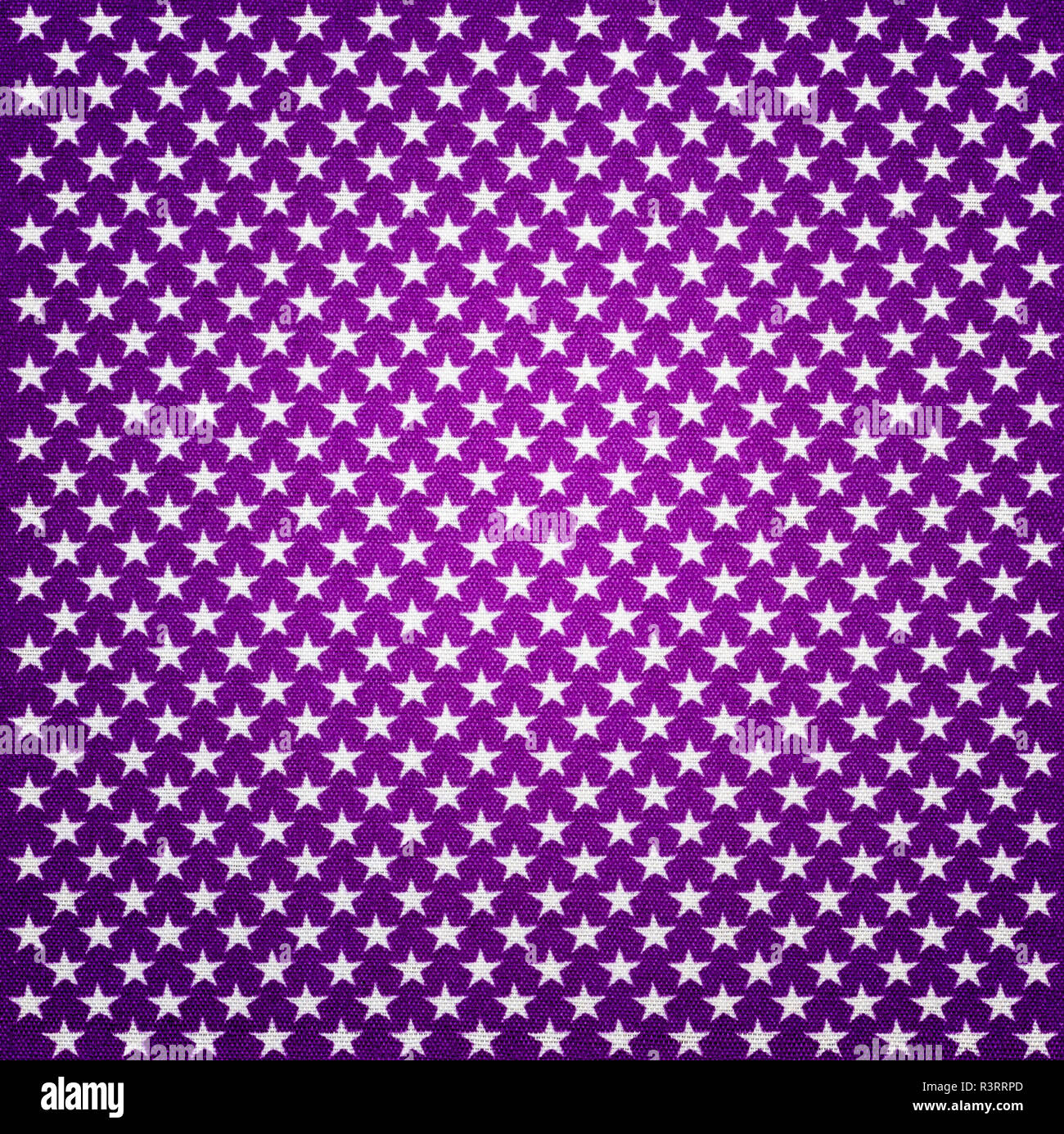 violet fabric with white stars with vignette Stock Photo - Alamy