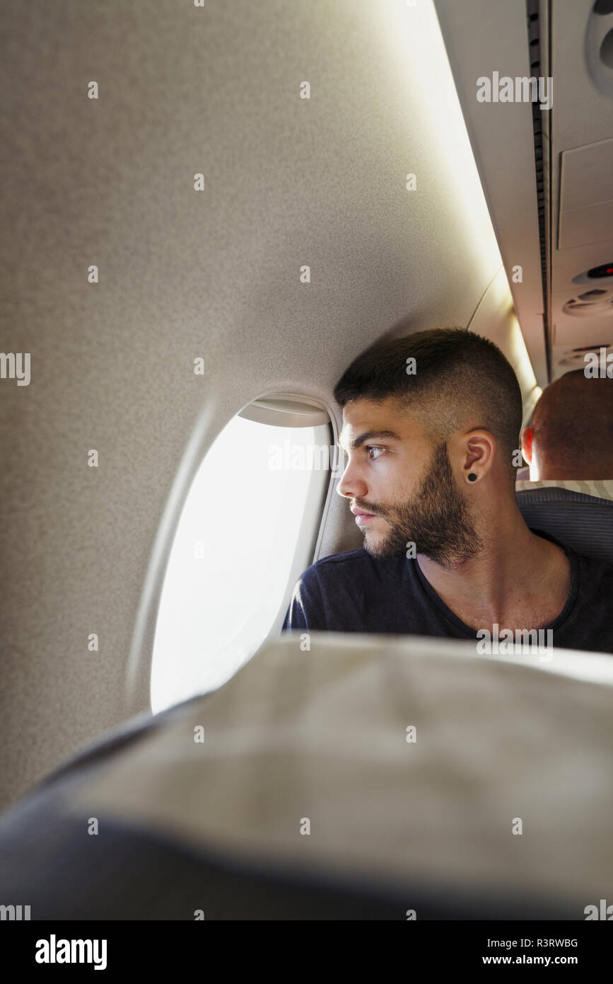 Looking out window seat plane hi-res stock photography and images - Alamy