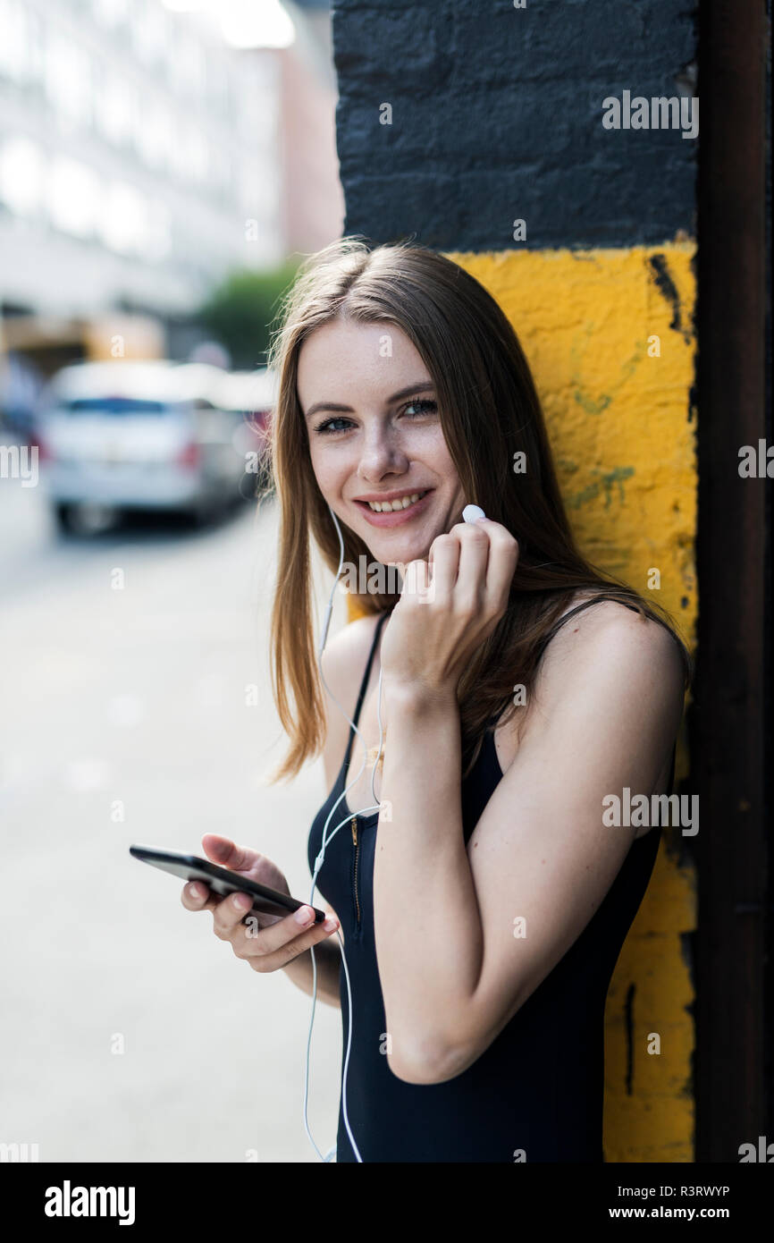 Woman on street corner hi-res stock photography and images - Alamy