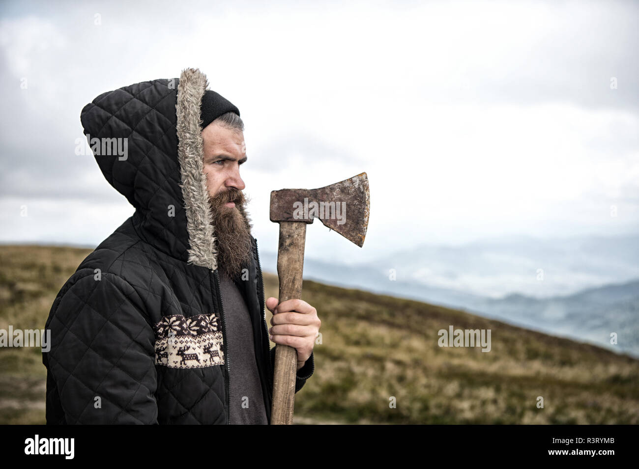 Handsome man hipster or guy with beard and moustache on serious face in ...
