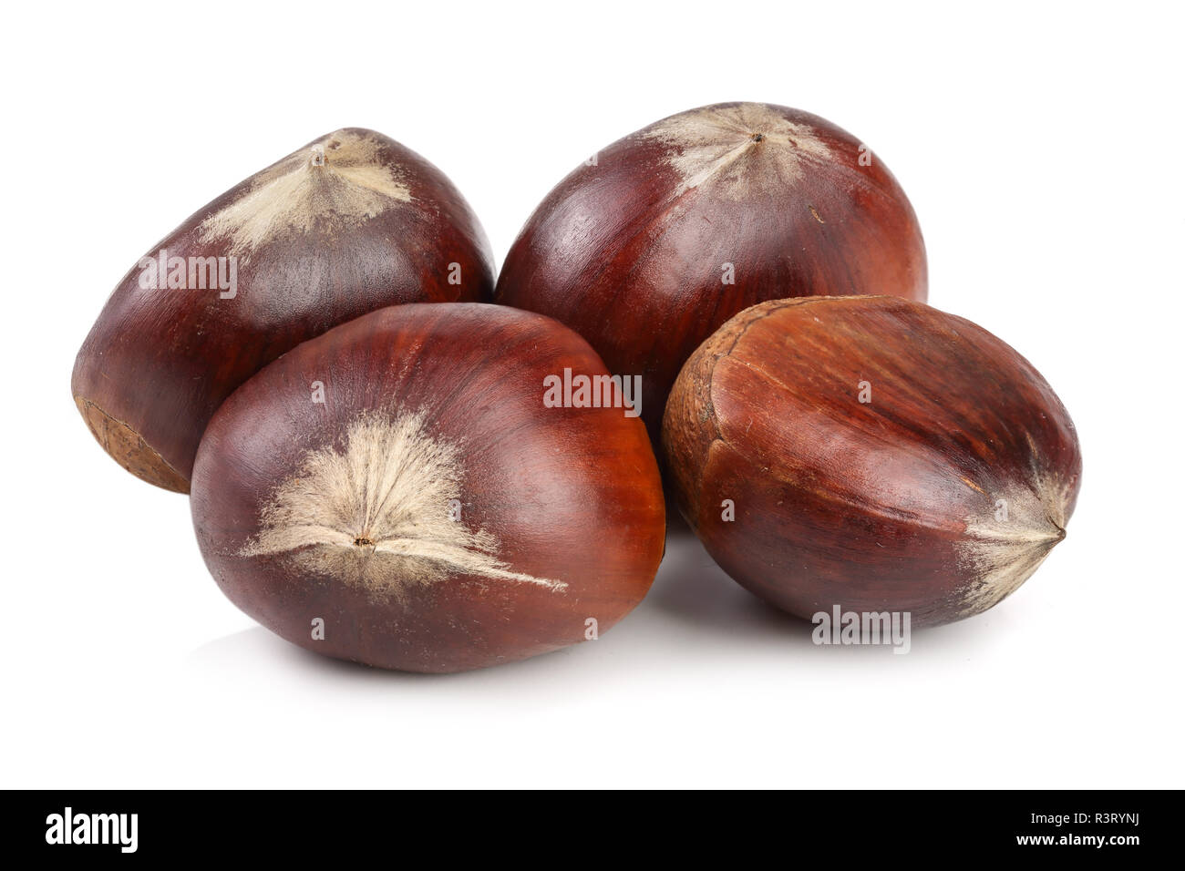 Heap chestnuts on white Cut Out Stock Images & Pictures - Alamy