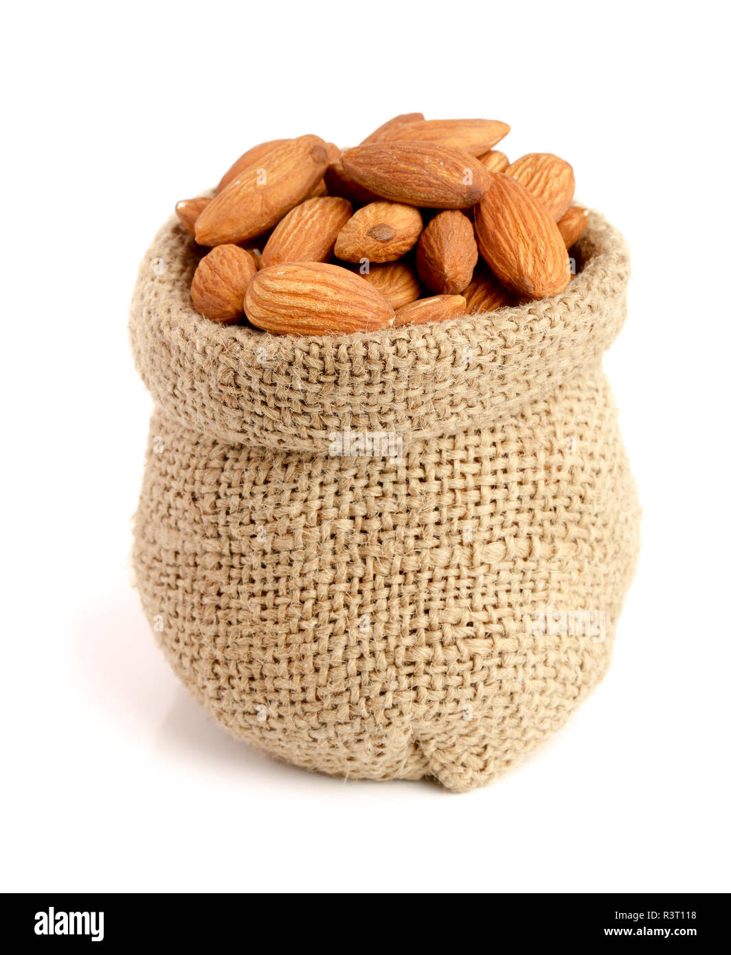 Almonds in bag from sacking isolated on white background Stock Photo ...