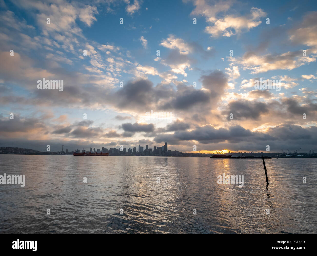 Sunrise On the Side of Downtown Seattle With Cloudy Skies Stock Photo ...
