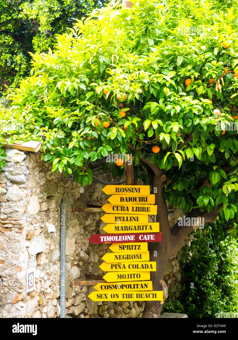 Taormina street signs in summer sunshine Stock Photo - Alamy