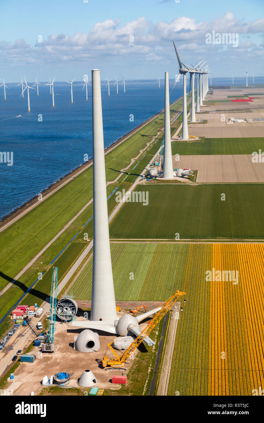 Aerial view of wind turbines under construction, North Holland ...