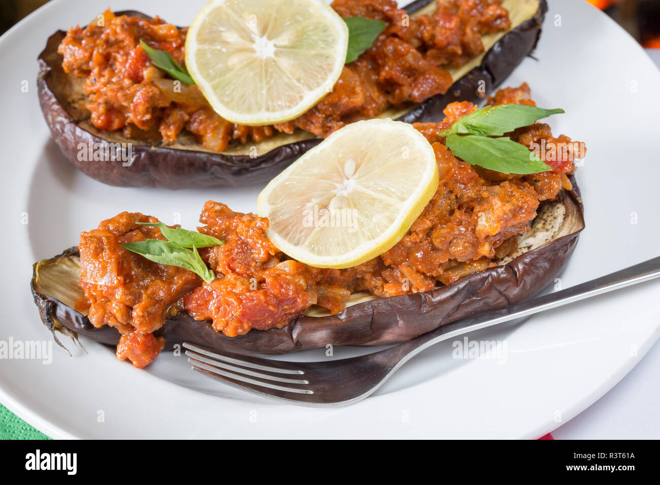 A Turkish dish of Imam bayildi, baked egg plant/aubergine with a minced ...
