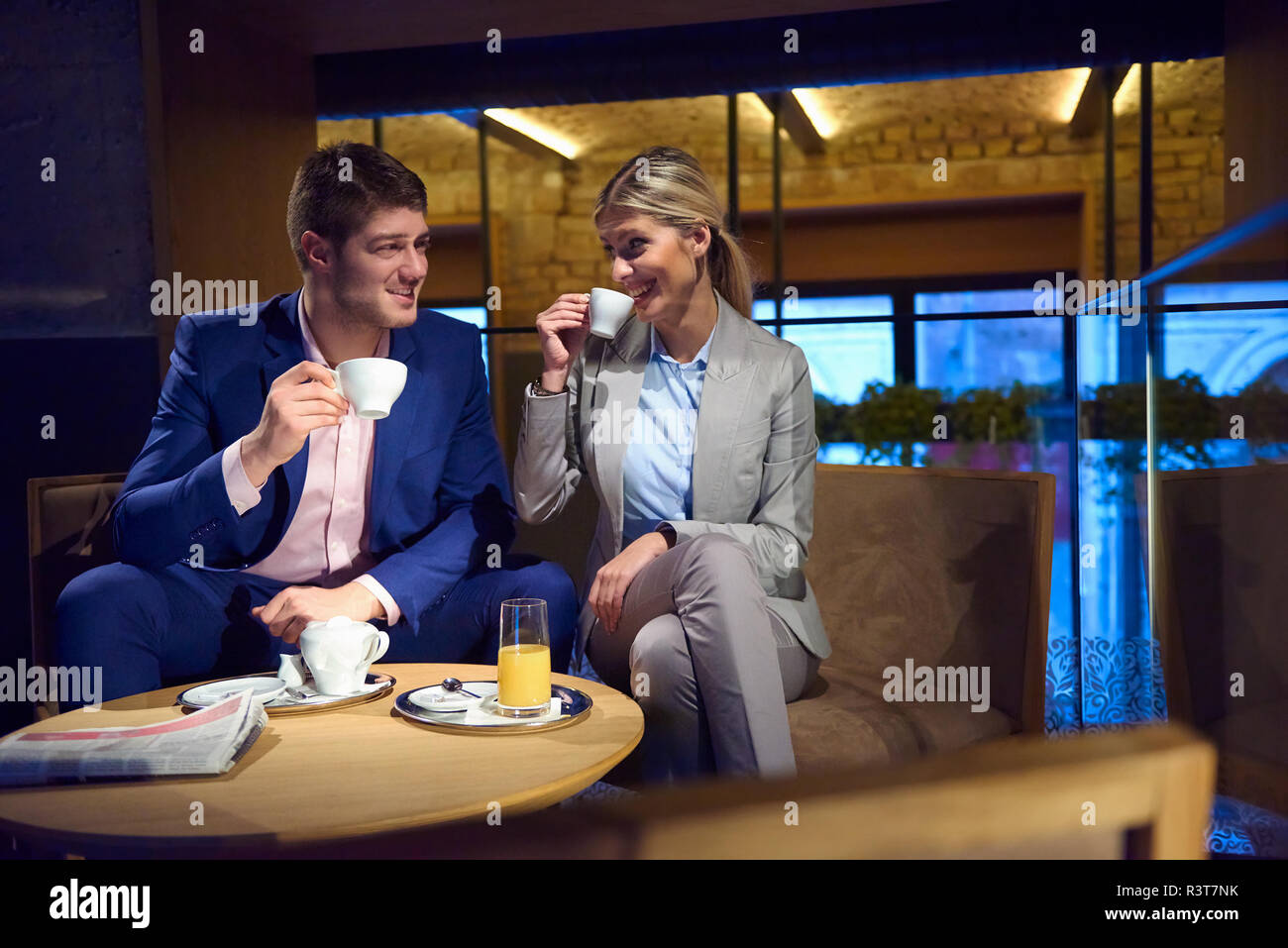 business couple take drink after work Stock Photo - Alamy