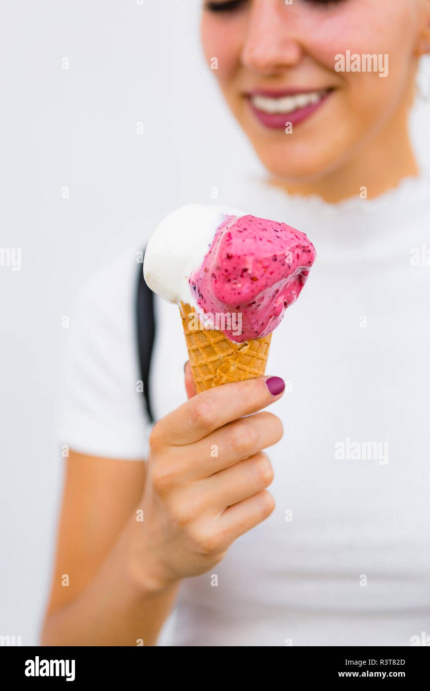 Womans hand holding ice cream hi-res stock photography and images - Alamy