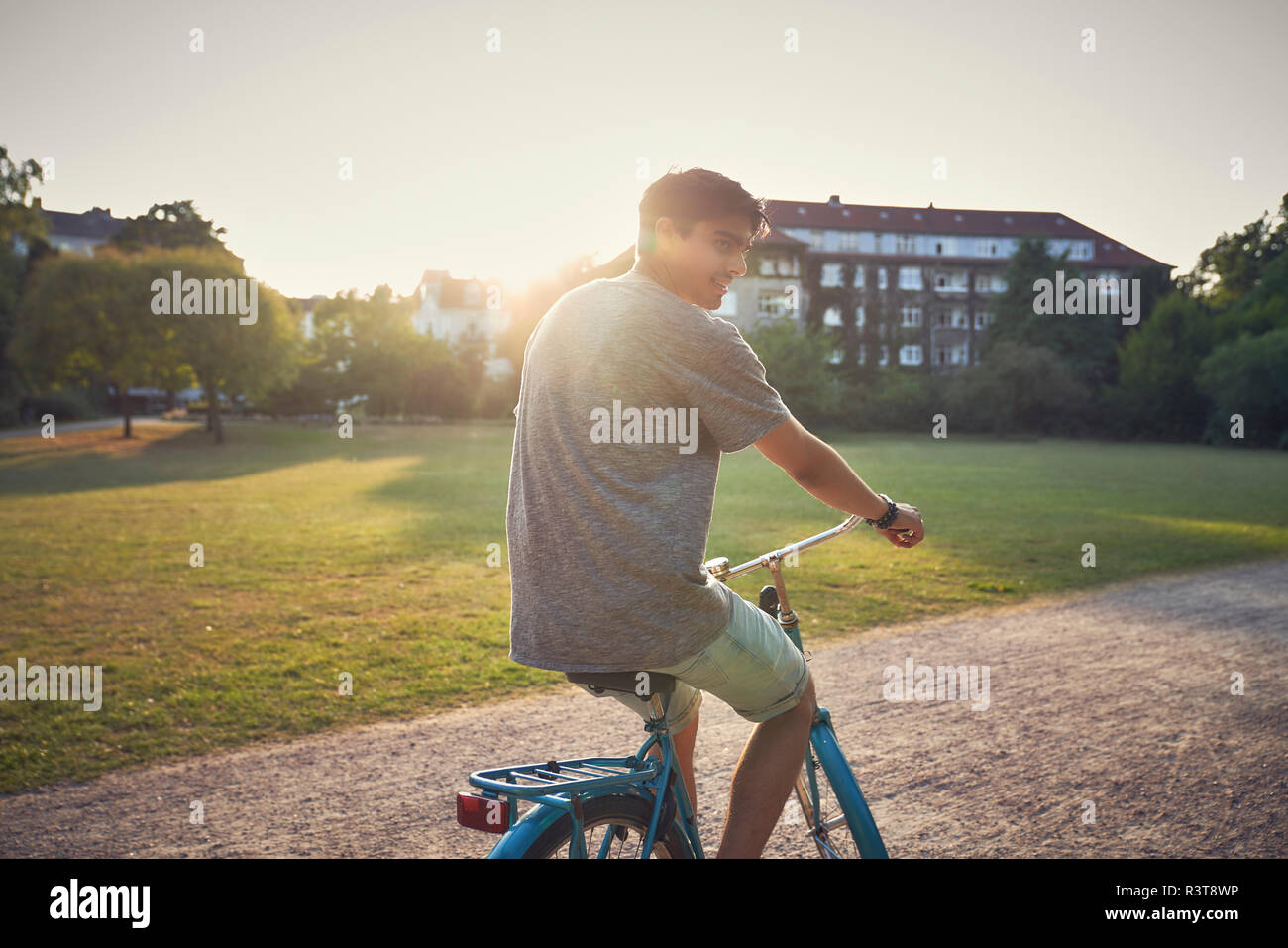 Young people cycling on bicycles hi-res stock photography and images ...