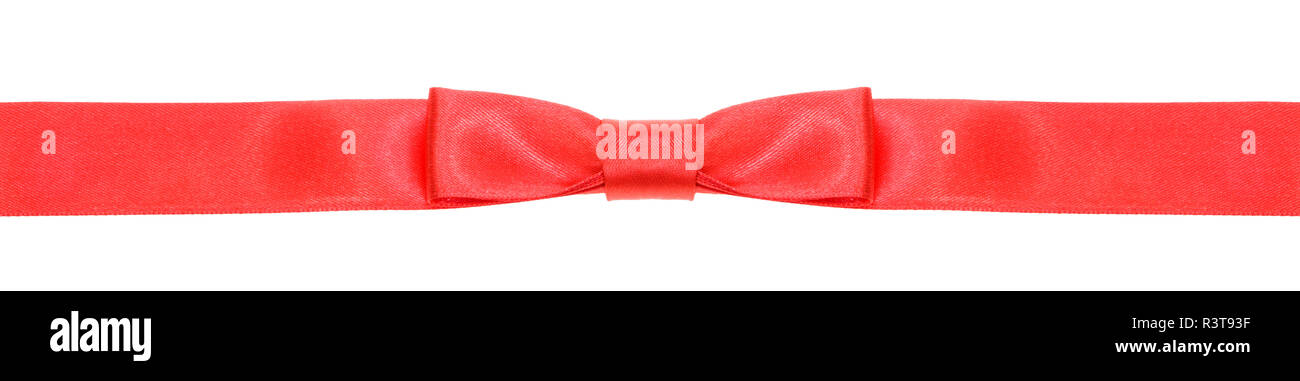 symmetric red bow knot on narrow silk ribbon Stock Photo - Alamy