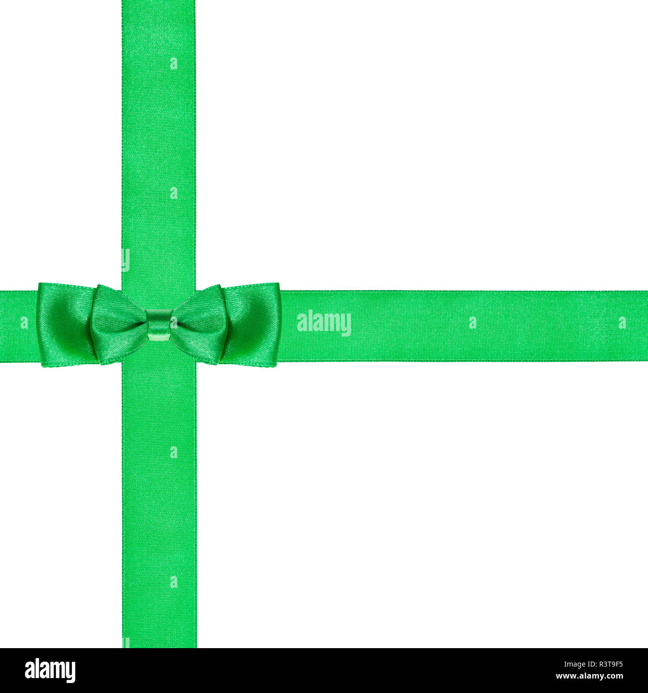 double green bow knot on two crossing satin ribbon Stock Photo - Alamy